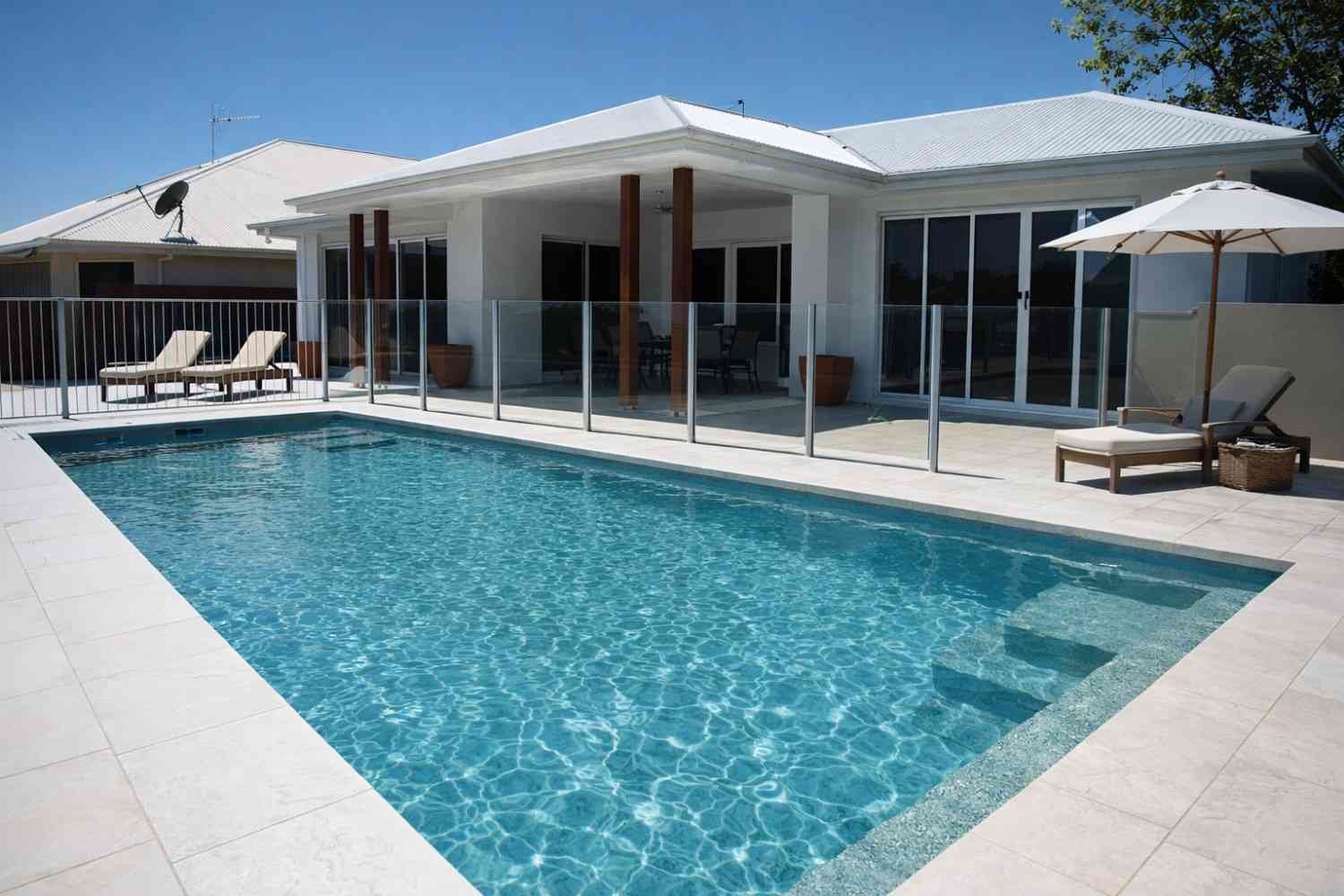 Custom Concrete Lap Pool Installation | Swimming Pool Experts Inc
